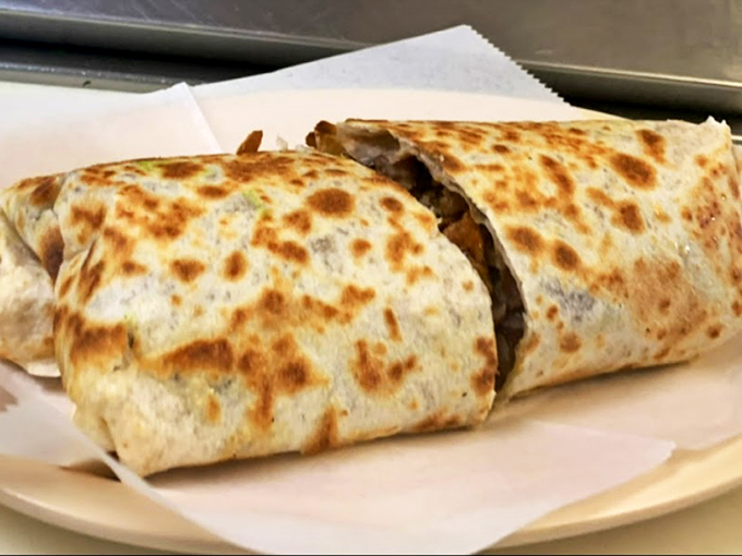 Burrito Behold the burrito&mdash;grilled to spotty perfection, it's like a warm, tortilla-wrapped hug waiting to happen.