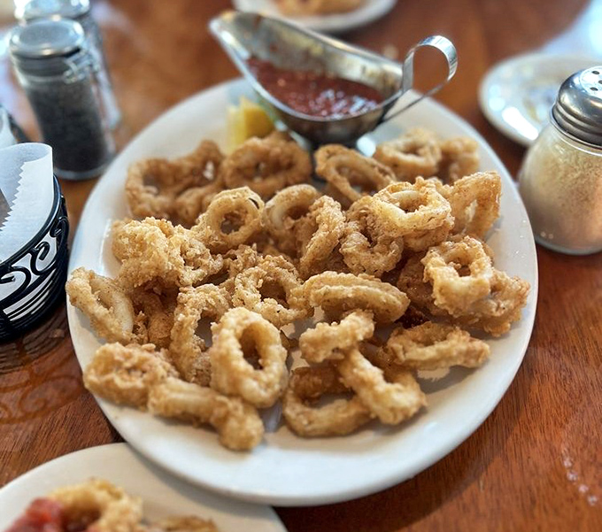 Calamari so perfectly crisp you'll forget you once called them "rubber bands with marinara" at lesser establishments.