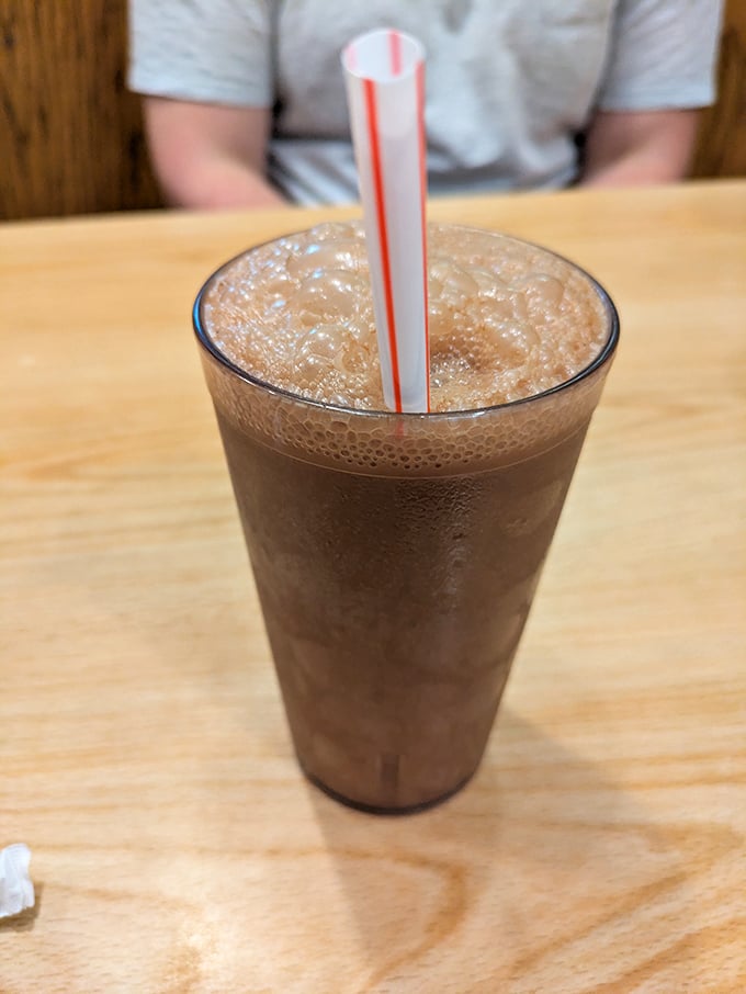 A chocolate phosphate fizzing with nostalgia &ndash; proof that sometimes the simplest combination (chocolate syrup + soda water) creates pure magic.
