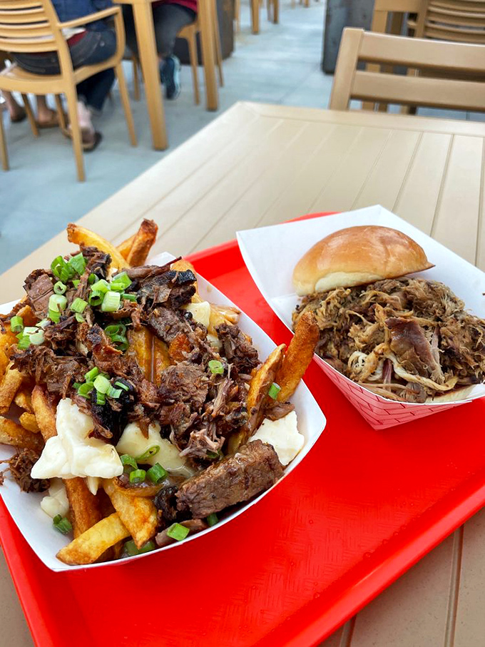 Poutine gets a smoky makeover with chopped brisket while a pulled pork sandwich waits patiently for its moment of glory.