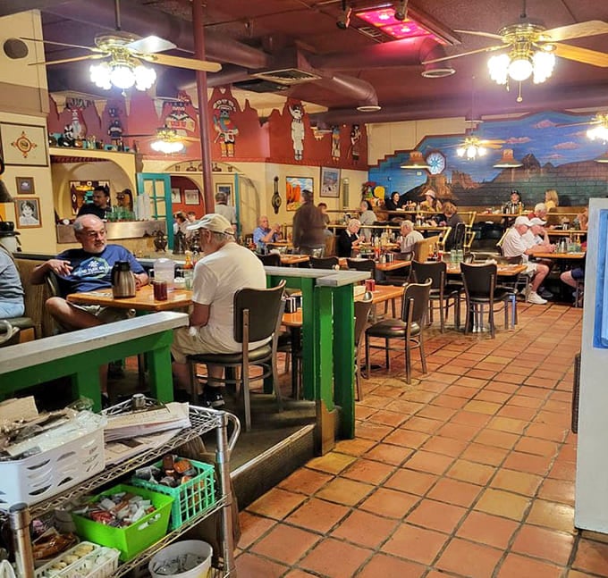 The dining room buzzes with happy conversations and the clinking of forks, where murals transport you deeper into desert country.