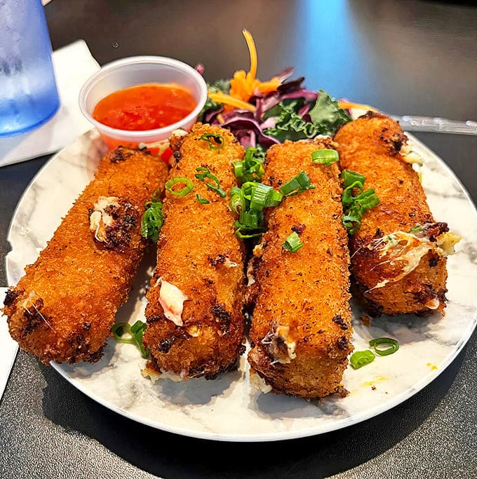 Crab Rangoon Mozzarella Sticks: The legendary fusion that launched a thousand road trips &ndash; crispy outside, creamy inside, and worth every mile of the journey.