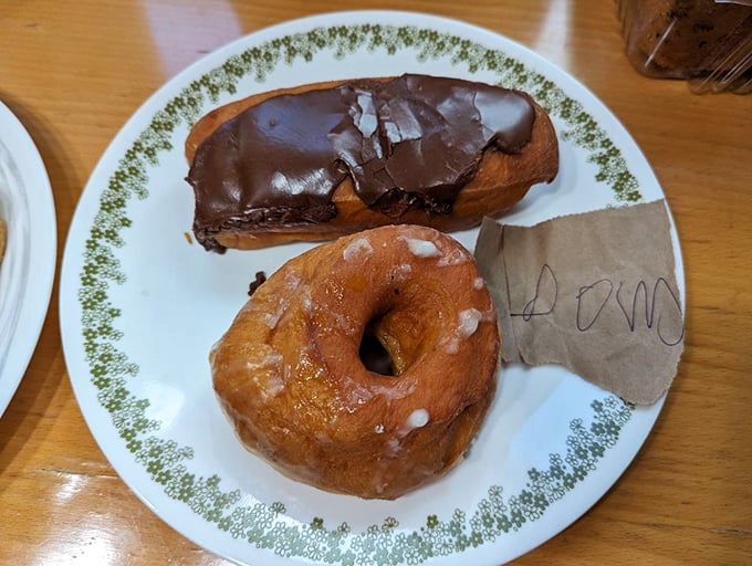 The dynamic duo of the donut world! This cream-filled long john and glazed donut are ready to save your morning.