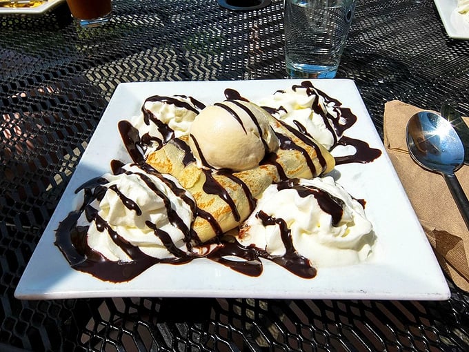 The hot-cold romance of warm crepe meeting cool ice cream, drizzled with chocolate &ndash; a temperature tango that dances across your taste buds.