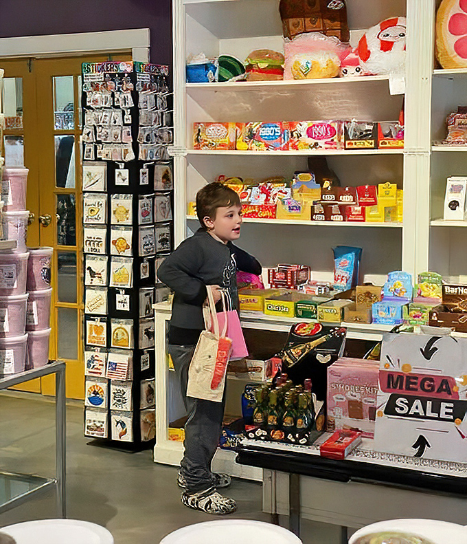 A young customer contemplates life's sweetest decisions, shopping bag in hand. The serious business of candy selection requires careful consideration at any age.