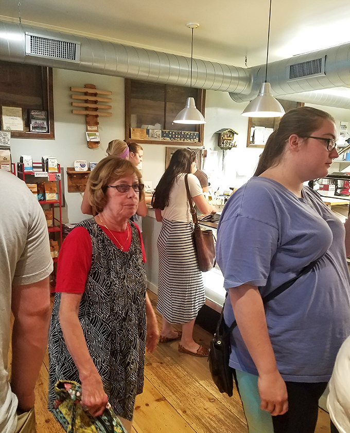 The weekend crowd patiently waits their turn, united by the universal language of carb appreciation.