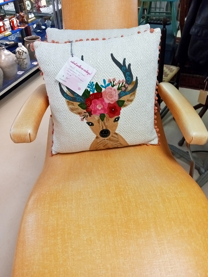 That deer pillow isn't just decor &ndash; it's the perfect conversation starter for your couch. "Yes, it's vintage. No, no actual deer were involved."