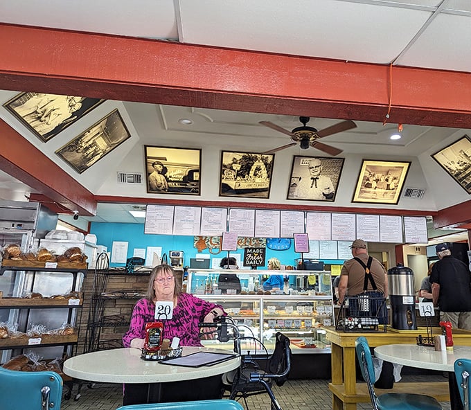 Black and white photographs line the walls, silent storytellers witnessing decades of first dates, family gatherings, and solo travelers seeking comfort in carbohydrates.