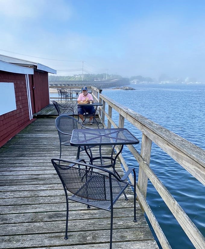 Dining with a view &ndash; a peaceful moment enjoying breakfast on the deck, where the misty Maine waters provide the perfect backdrop.