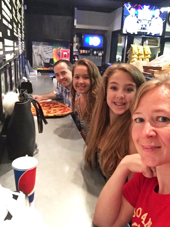 Happy faces tell the real story at Mr. Z's &ndash; where strangers become friends and friends become family over shared pizza passion.