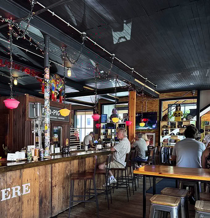 The bar area hums with conversation as patrons bond over shared plates and craft beer recommendations &ndash; strangers becoming temporary friends in the warm glow of good food.