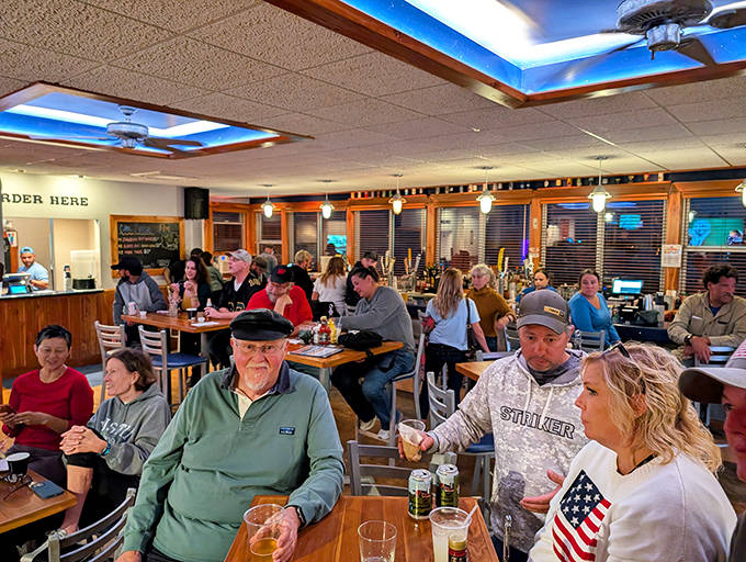 The dining room buzzes with conversation as locals and tourists alike bond over plates of homestyle cooking, creating a community connected by good food.
