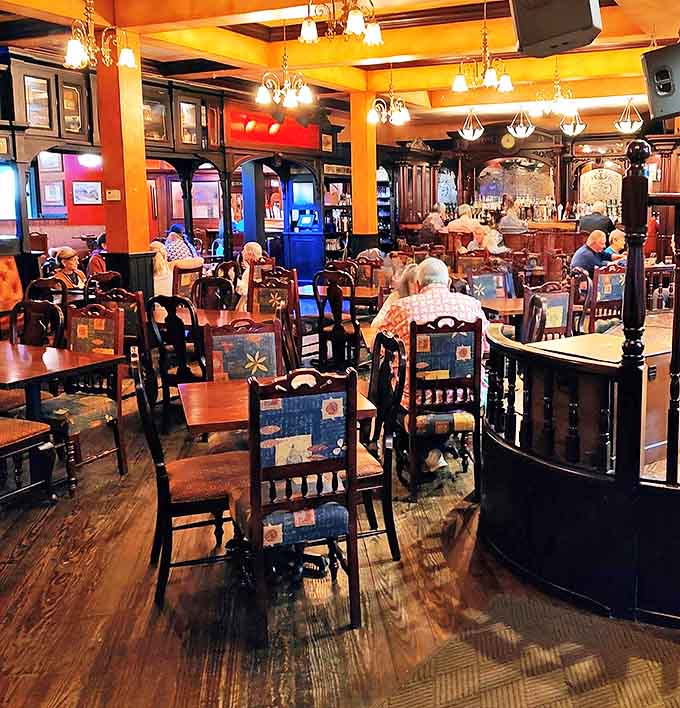 The dining room hums with conversation and laughter as patrons enjoy that magical combination of good food, drink, and company.