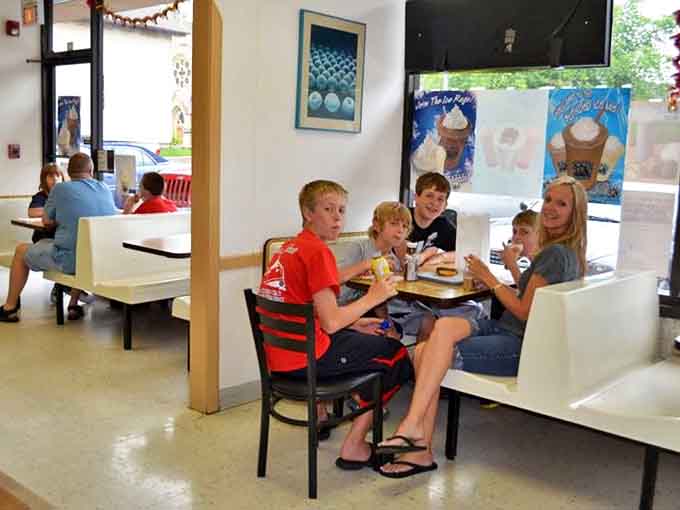 Families gather in the cozy dining area, creating memories over breakfast sandwiches and donuts worth waking up for.