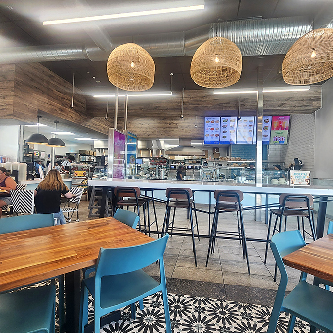 The dining area strikes that perfect balance between spacious and cozy, with beach-themed d&eacute;cor transporting you straight to the Hawaiian islands.