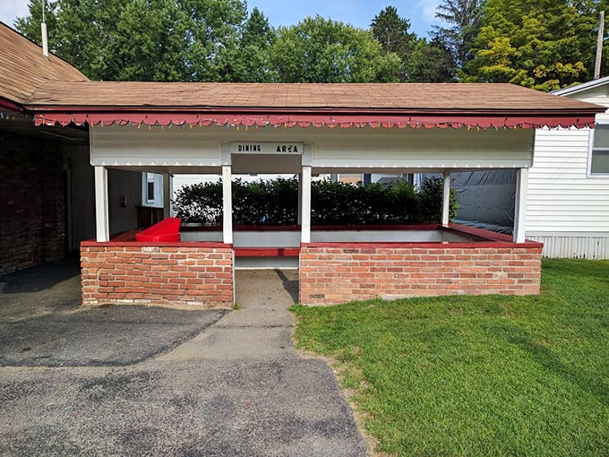 The dining area offers no-frills seating with million-dollar charm &ndash; red-topped tables where memories are made between bites of American classics.