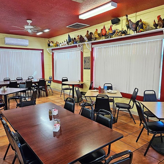 The dining area's terra cotta floors and rooster-themed decor create a space that feels more like someone's home than a restaurant.