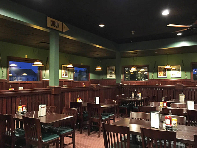 The dining room's mix of booths and tables under warm lighting creates the perfect setting for everything from family dinners to date nights.