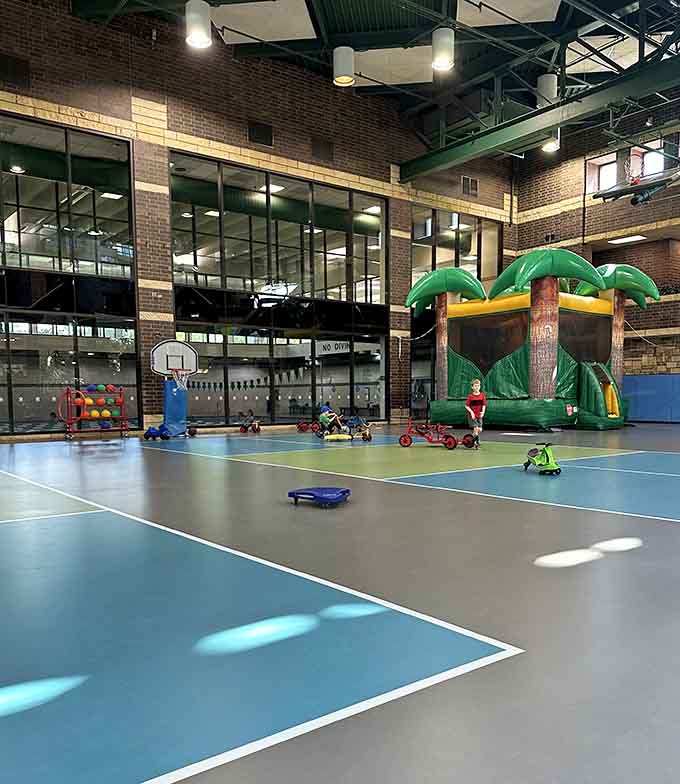 The basketball court proves that Edinborough Park isn't just about climbing, offering space for kids to practice their nonexistent NBA careers.