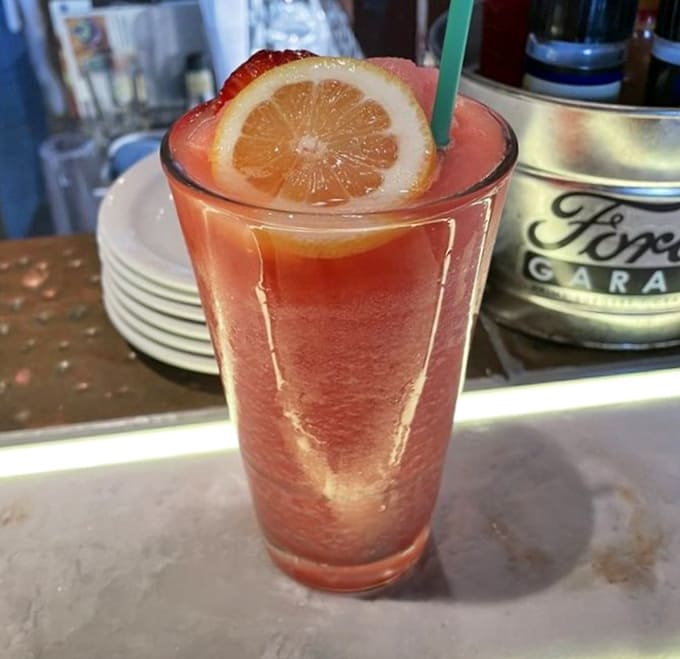 Refreshing strawberry lemonade cuts through the richness of those hearty burgers, offering sweet relief without being cloying, like summer in a glass with a grapefruit garnish.