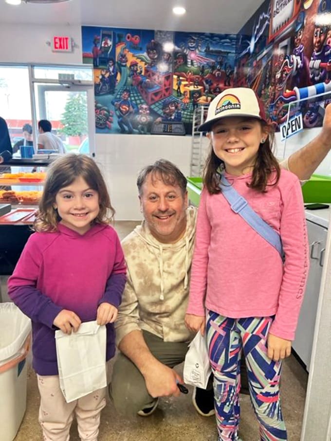 Happy customers young and old prove that giant donut holes are the great generational unifier we needed.