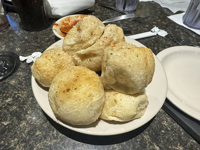 Garlic knots so pillowy and fragrant they should be classified as aromatherapy&mdash;carbs that heal the soul one buttery bite at a time.