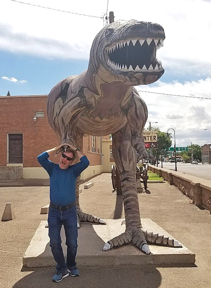 "I think I'm going to need a bigger car!" Visitors find themselves dwarfed by prehistoric proportions.