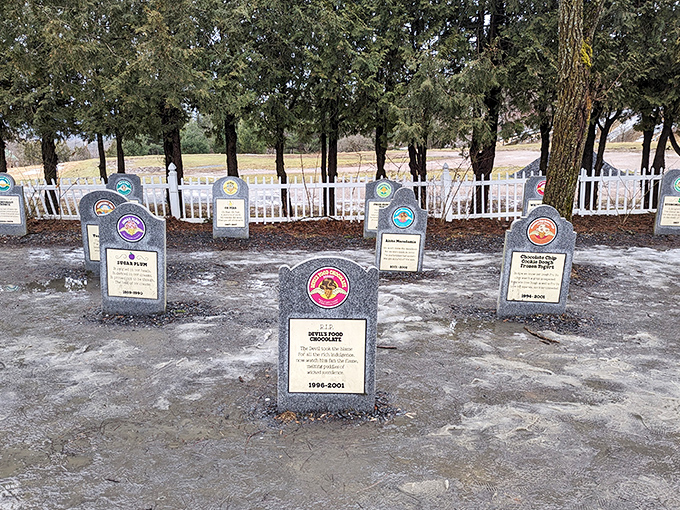Winter transforms the Flavor Graveyard into an eerily beautiful scene, with headstones peeking through the snow like frozen memories.