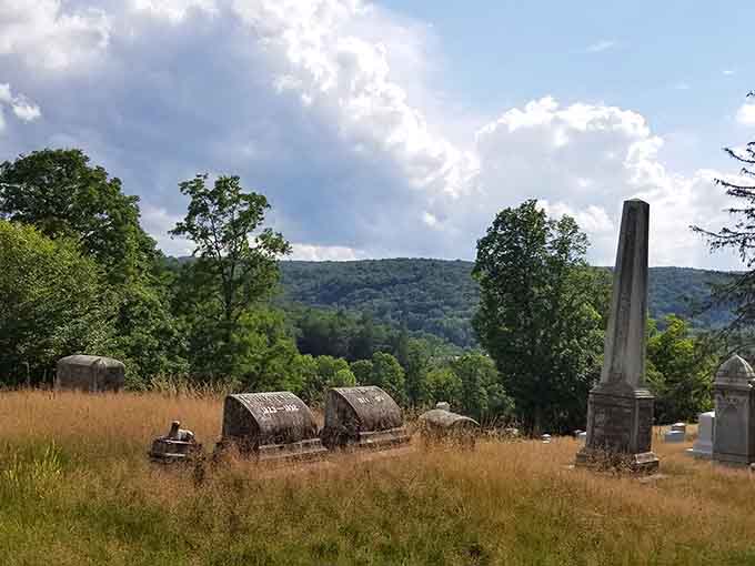 Gravestones dot the hillside like a stone garden, each one marking a life lived and a story that deserves remembering, even if the details have faded.