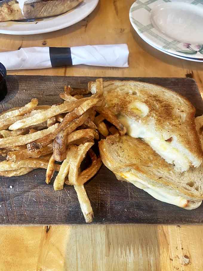 Sometimes simple is sublime, and this grilled cheese with hand-cut fries proves comfort food never goes out of style.