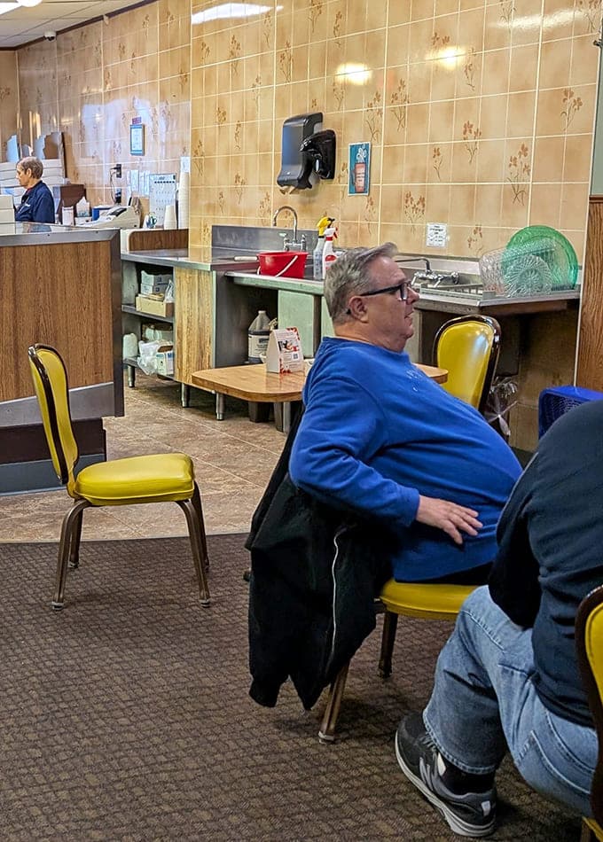 The dining area invites you to sit, stay, and watch the bakery magic happen while enjoying your treats in comfortable surroundings.