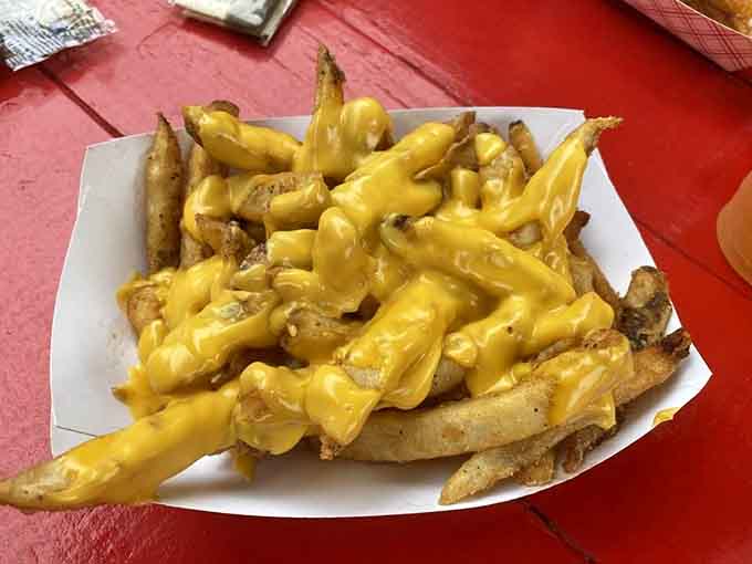 Cheese fries at Hazel's, where they understand that melted cheese on crispy potatoes is basically comfort in edible form.
