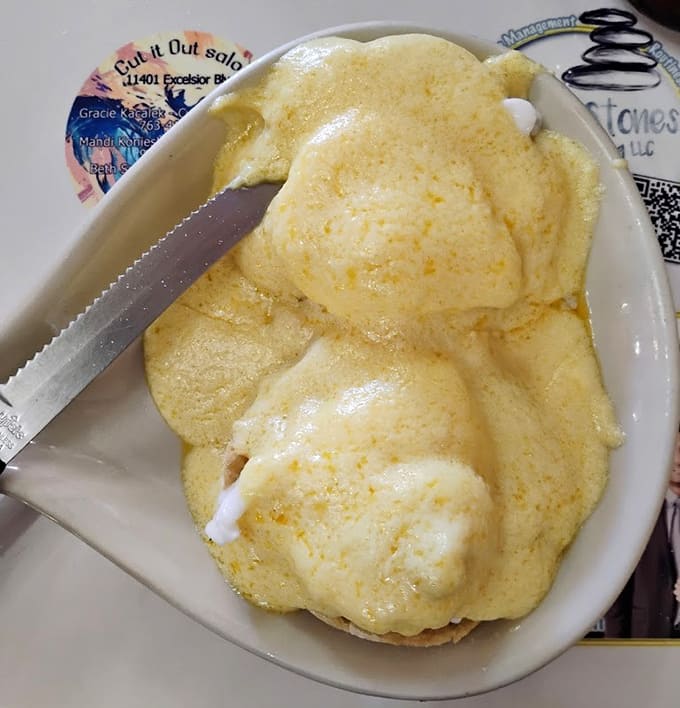 Eggs Benedict done right, with perfectly poached eggs and hollandaise that would make brunch enthusiasts weep with joy.