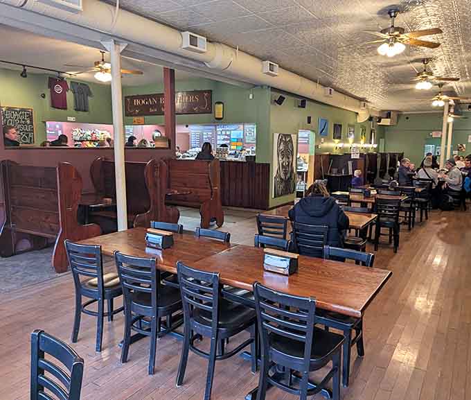 The spacious dining room with its tin ceiling and wooden floors welcomes everyone from college students to longtime locals seeking their hoagie fix.