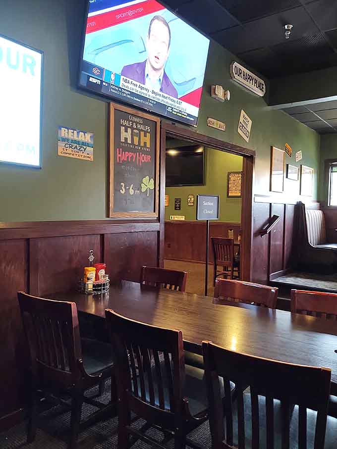 The dining area offers cozy booths and tables where locals gather, with TVs overhead ensuring you never miss the big game or breaking news.