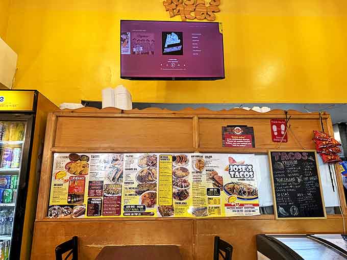 The comprehensive menu board showcases the full range of options, from classic tacos to hearty dinners that feed body and soul.
