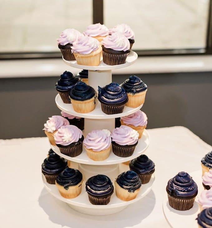 Those cupcakes with their swirled frosting peaks look like tiny edible works of art that almost seem too pretty to eat, but only almost.
