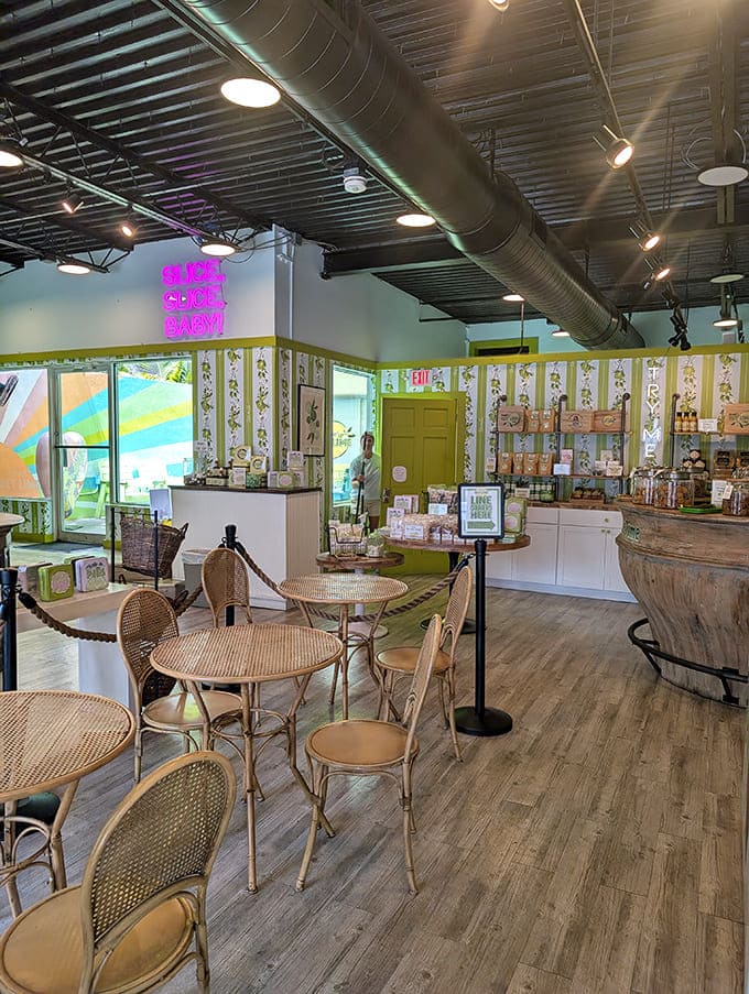 Modern meets tropical in this airy space where lime-striped walls and golden pendant lights create the perfect pie-eating atmosphere.