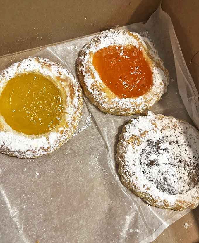 Fruit-filled kolacky cookies wait patiently in their powdered sugar coats – little packages of joy that connect generations through taste.