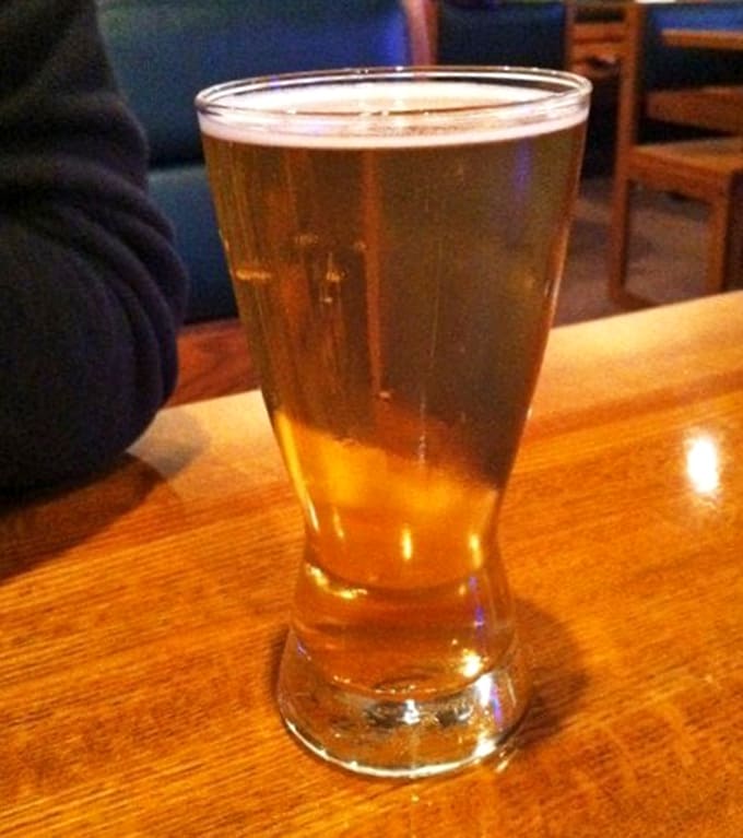 Cold craft beer pairs perfectly with hot burgers, creating the kind of harmony that makes life worth living.