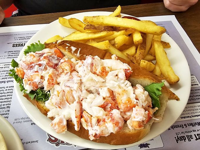 The lobster roll that launched a thousand road trips &ndash; sweet meat, minimal mayo, grilled bun, and fries that deserve their own fan club.