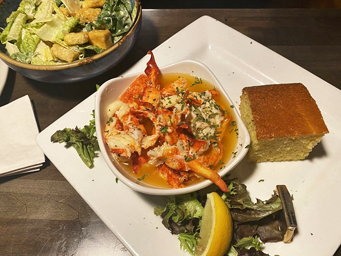 Fresh lobster swimming in butter sauce, proving that sometimes the simplest preparations are the most luxurious.