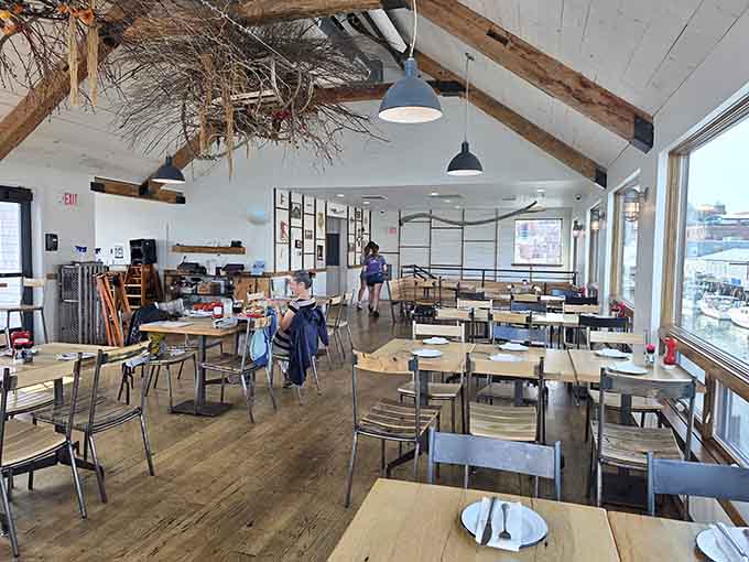 Exposed beams and nautical touches create that effortlessly cool coastal vibe where everyone feels like a regular from day one.