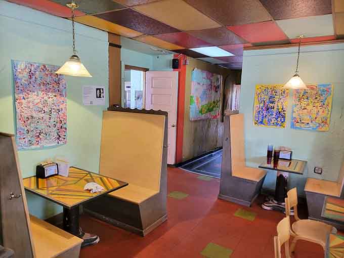 The striped tables and colorful ambiance create a dining experience that's as visually satisfying as the food is delicious.