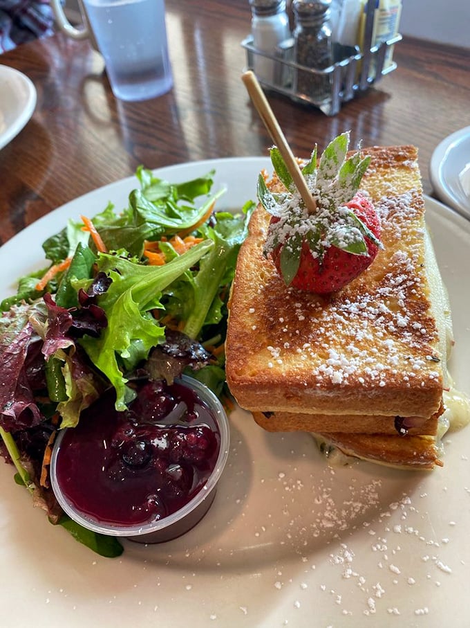 A Monte Cristo sandwich that's dressed up for brunch, complete with a fresh salad and berry compote.
