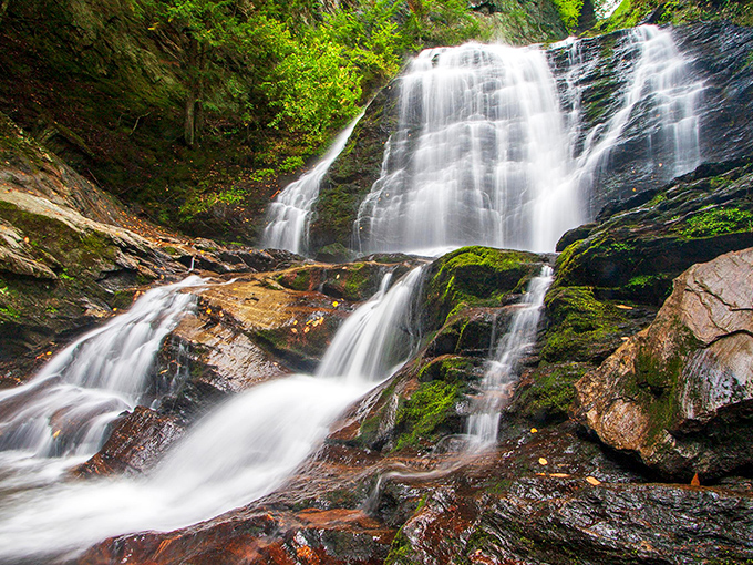 Moss Glen Falls cascades through Vermont wilderness, a refreshing reminder that autumn's beauty extends beyond just colorful trees.