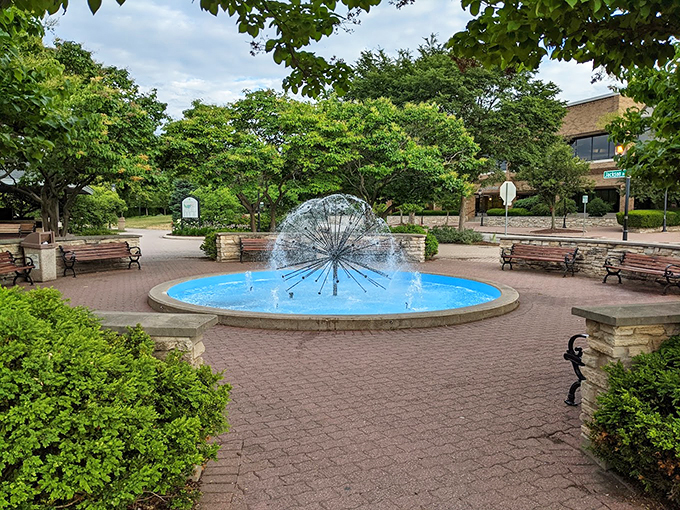 Water dances in perfect harmony with fall foliage. This fountain adds a splash of whimsy to the autumnal symphony surrounding it.