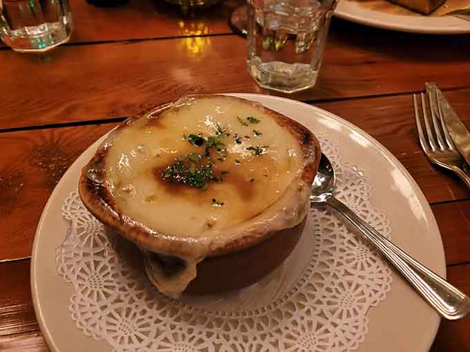 French onion soup with that glorious cheese blanket, the kind that stretches when you lift your spoon dramatically.