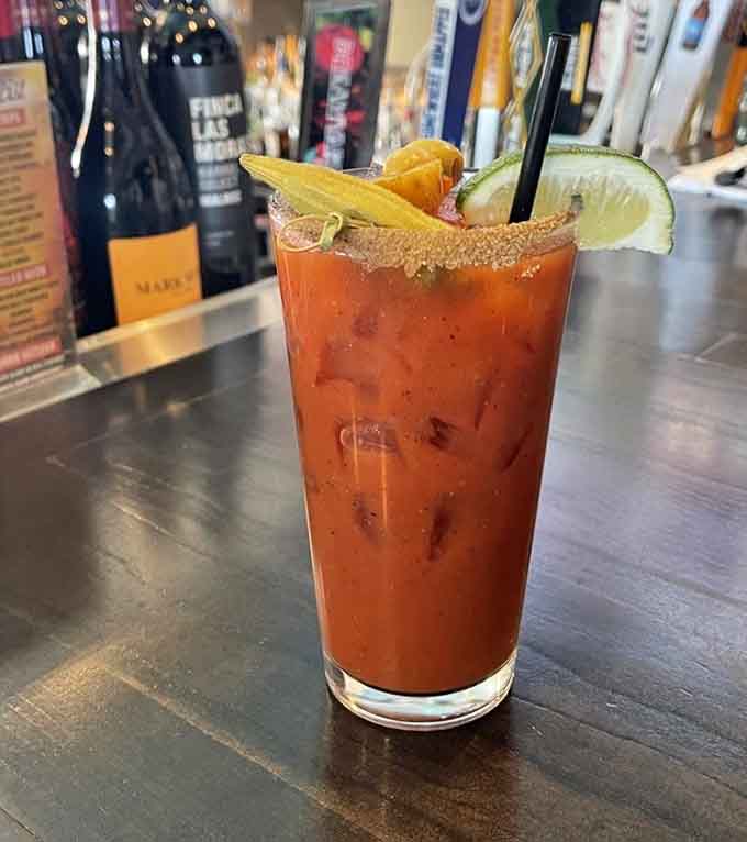 The Bloody Mary comes loaded with garnishes that could qualify as a meal, making it the perfect companion to your brunch adventure at North Coop.