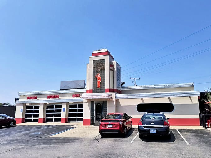 Parking Area: The vintage gas pump sign stands tall, a retro sentinel guiding hungry travelers to their delicious destination.